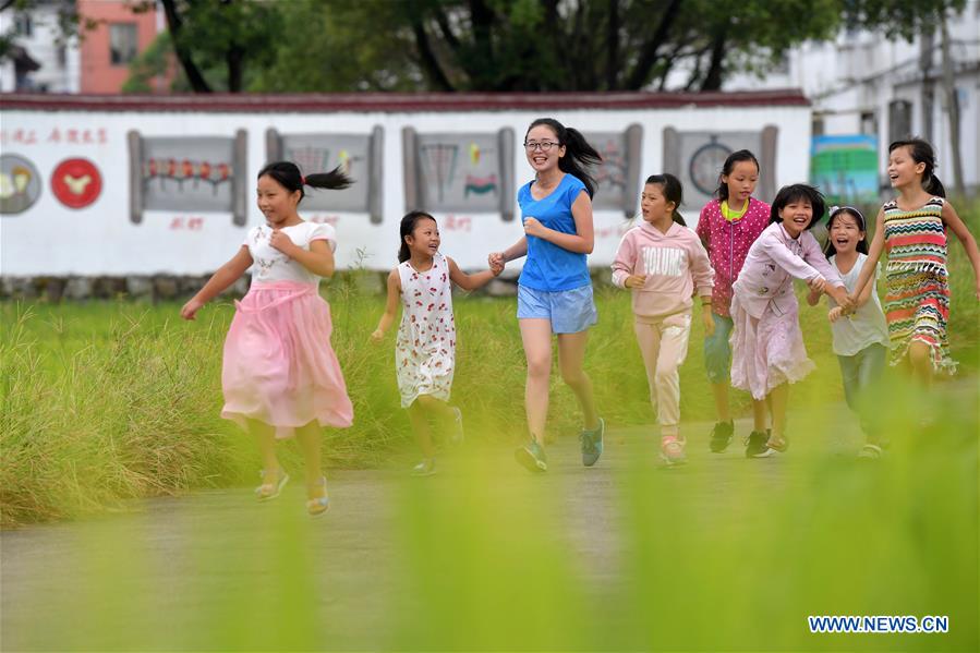 Pic story of teacher who devotes herself to rural education in China's ...