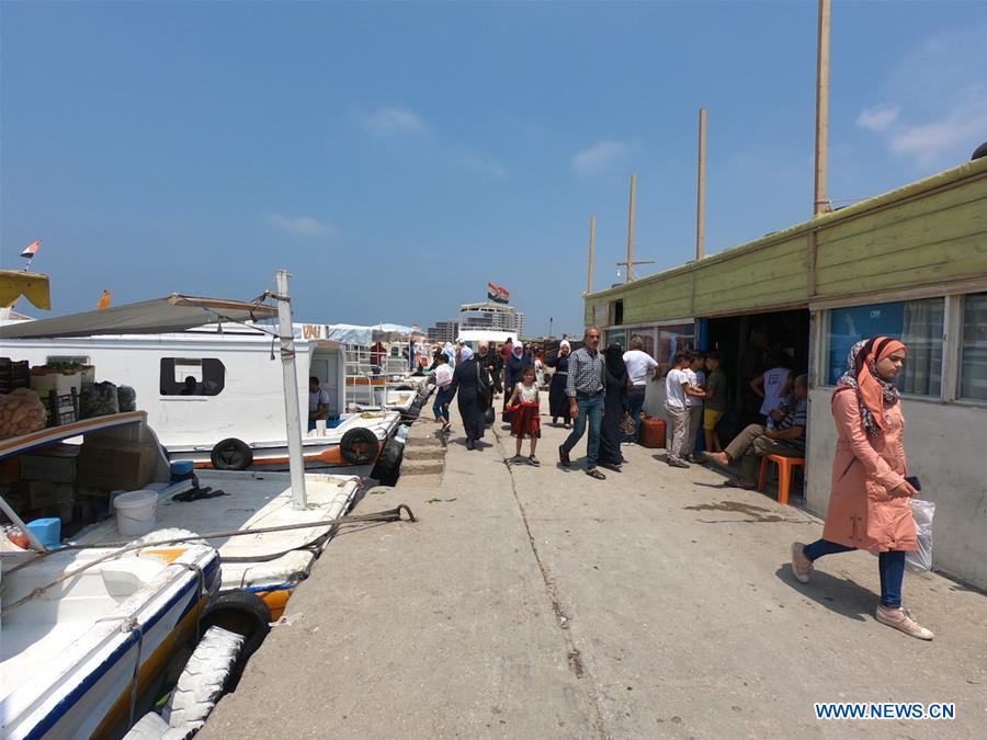 Syrian island escapes war, but caught by tough economic situation ...