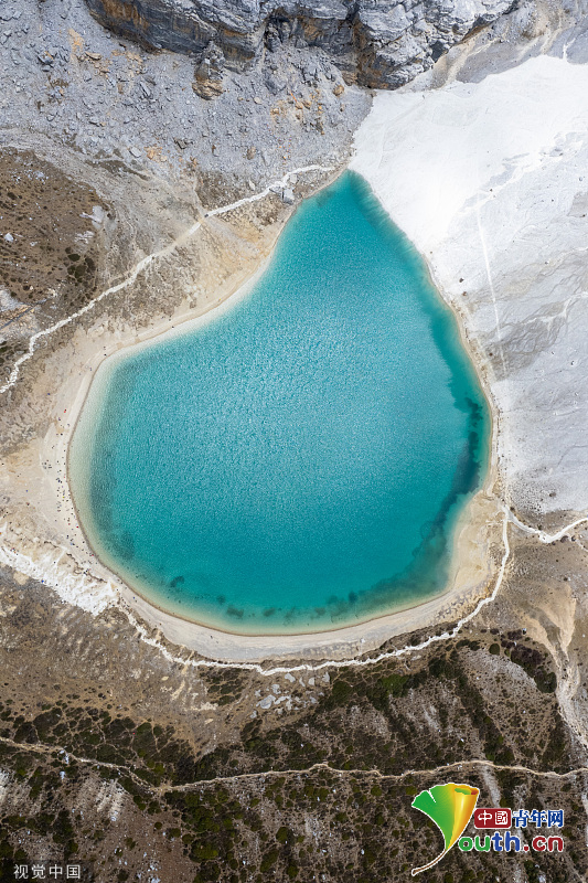 The sun shines on the blue water of the Milk Lake in Ganzi, Sichuan_English__China Youth ...